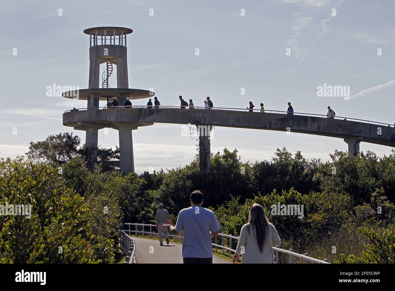 Visitors walk up to the observation tower at Shark Valley in Everglades ...