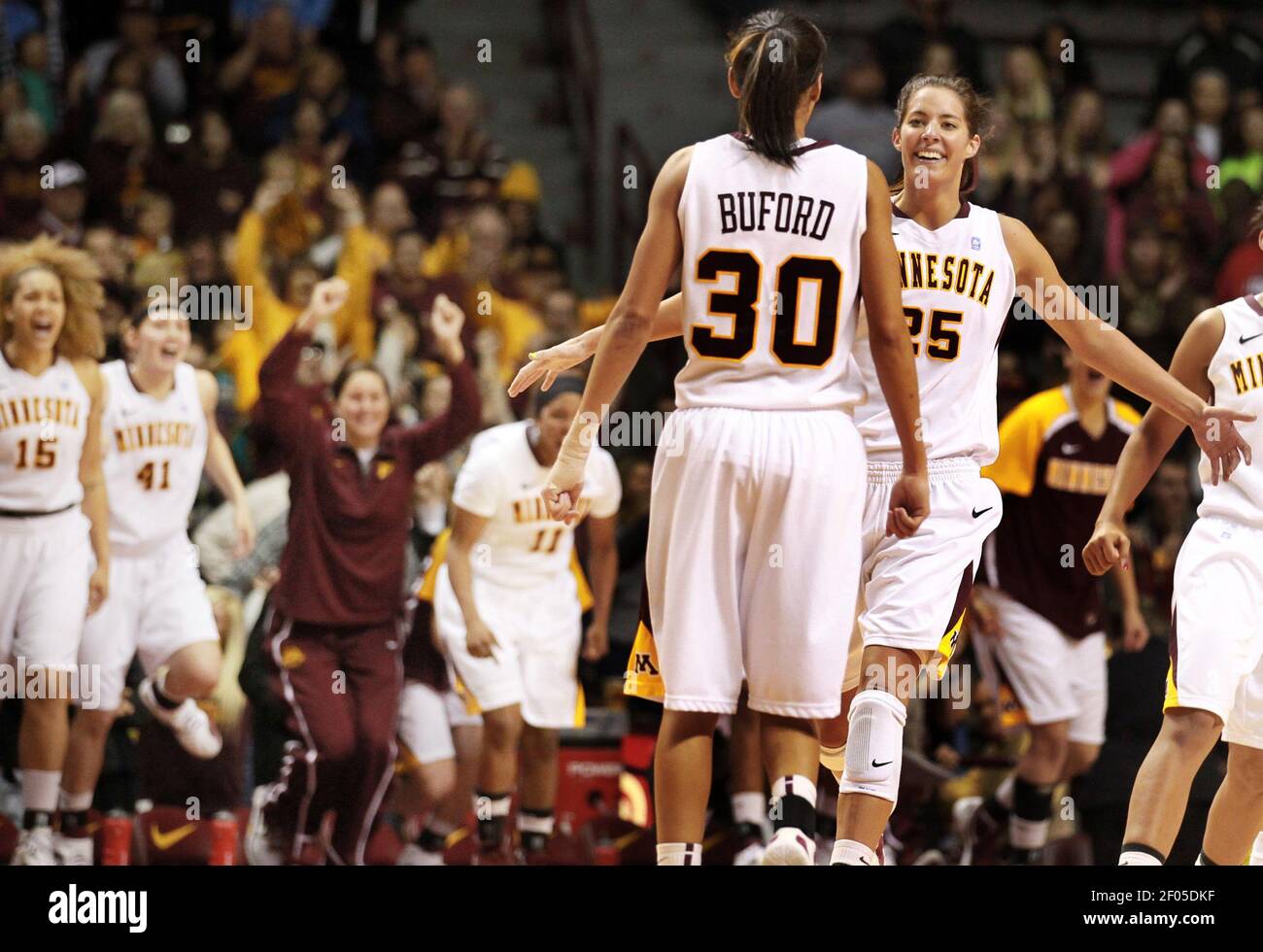 Minnesota's Katie Loberg, celebrates with teammate Kiara Buford after ...