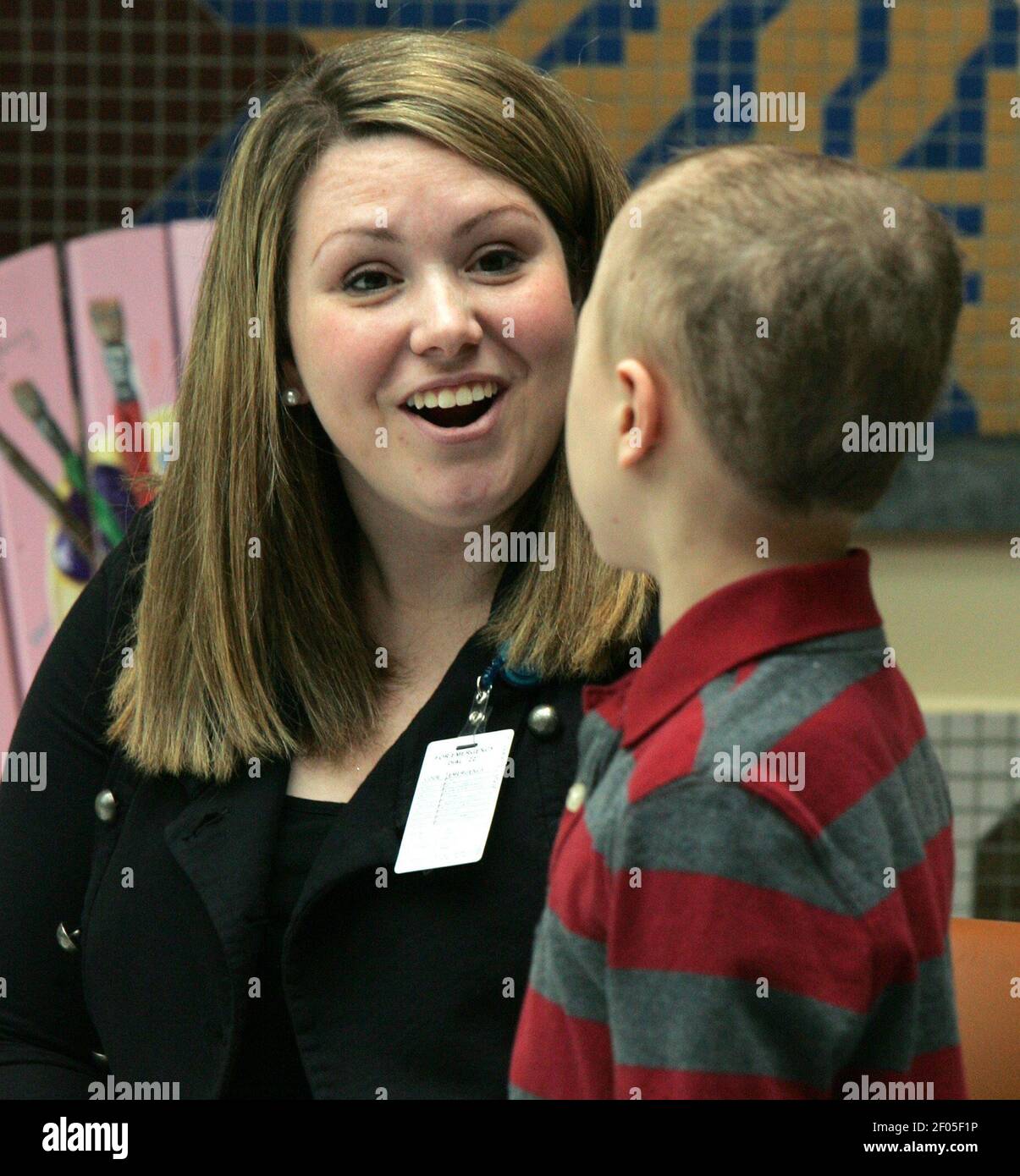 Emily Dennis, left, artist-in-residence at Akron Children's Hospital ...