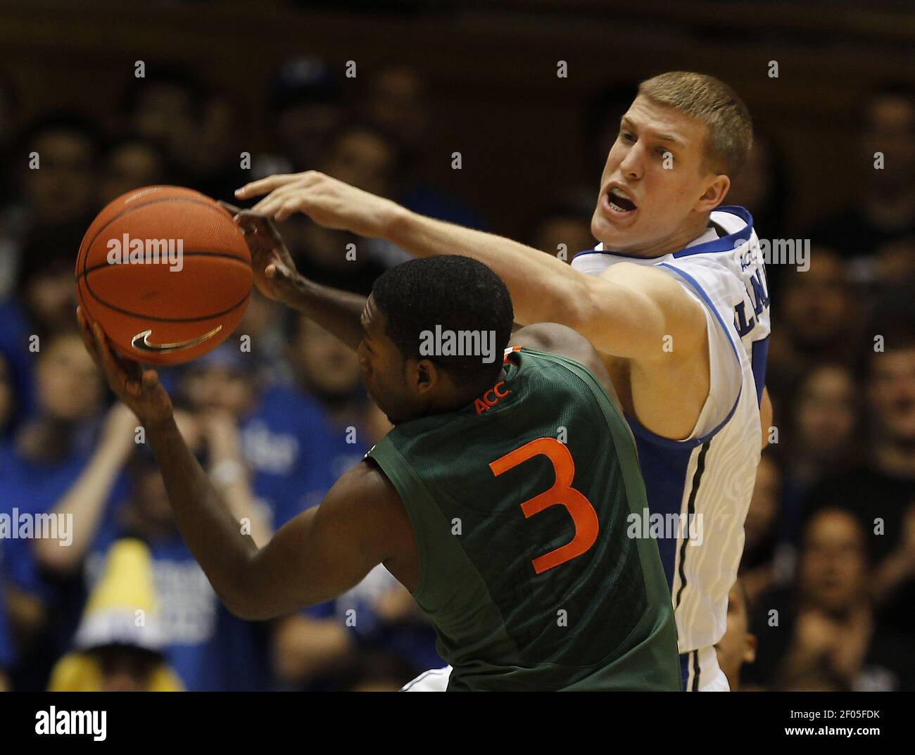 Duke forward Mason Plumlee (5) looses a rebound battle to Miami guard ...