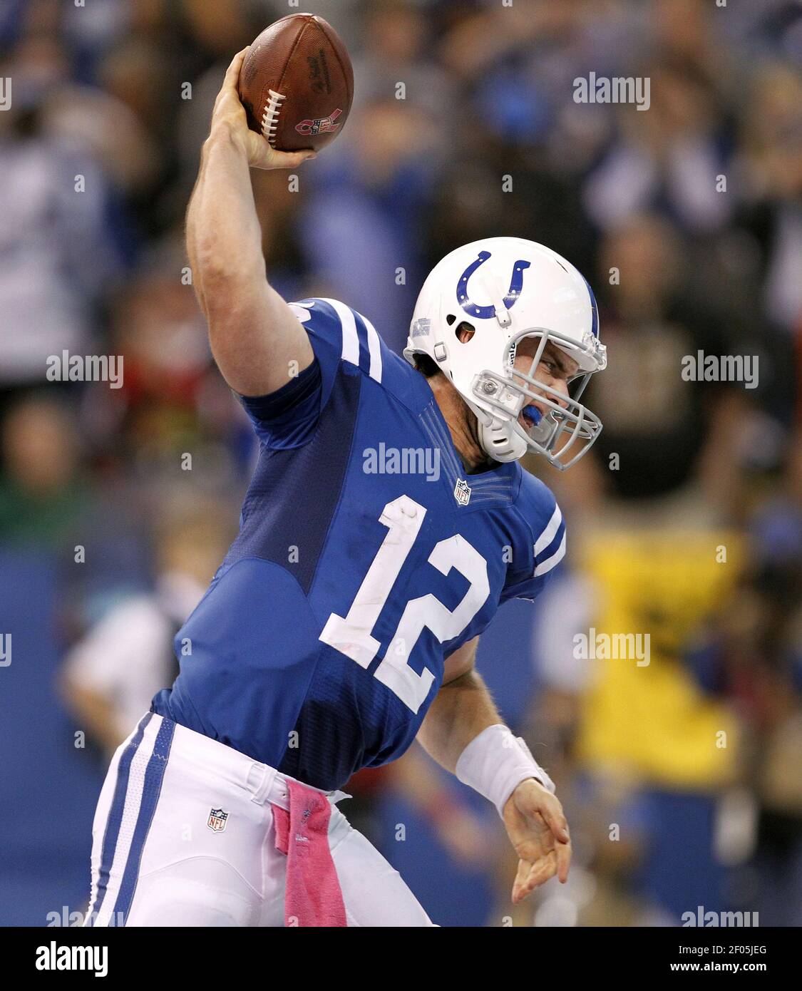 Indianapolis Colts quarterback Andrew Luck (12) spikes the ball after ...