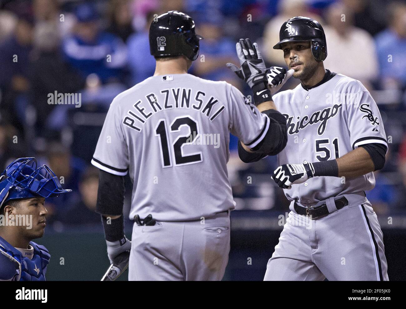 Alex Rios (51) of the Chicago White Sox is congratulated by teammate A ...
