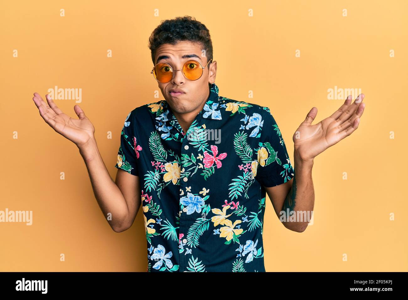 Young handsome african american man wearing summer style clueless and ...