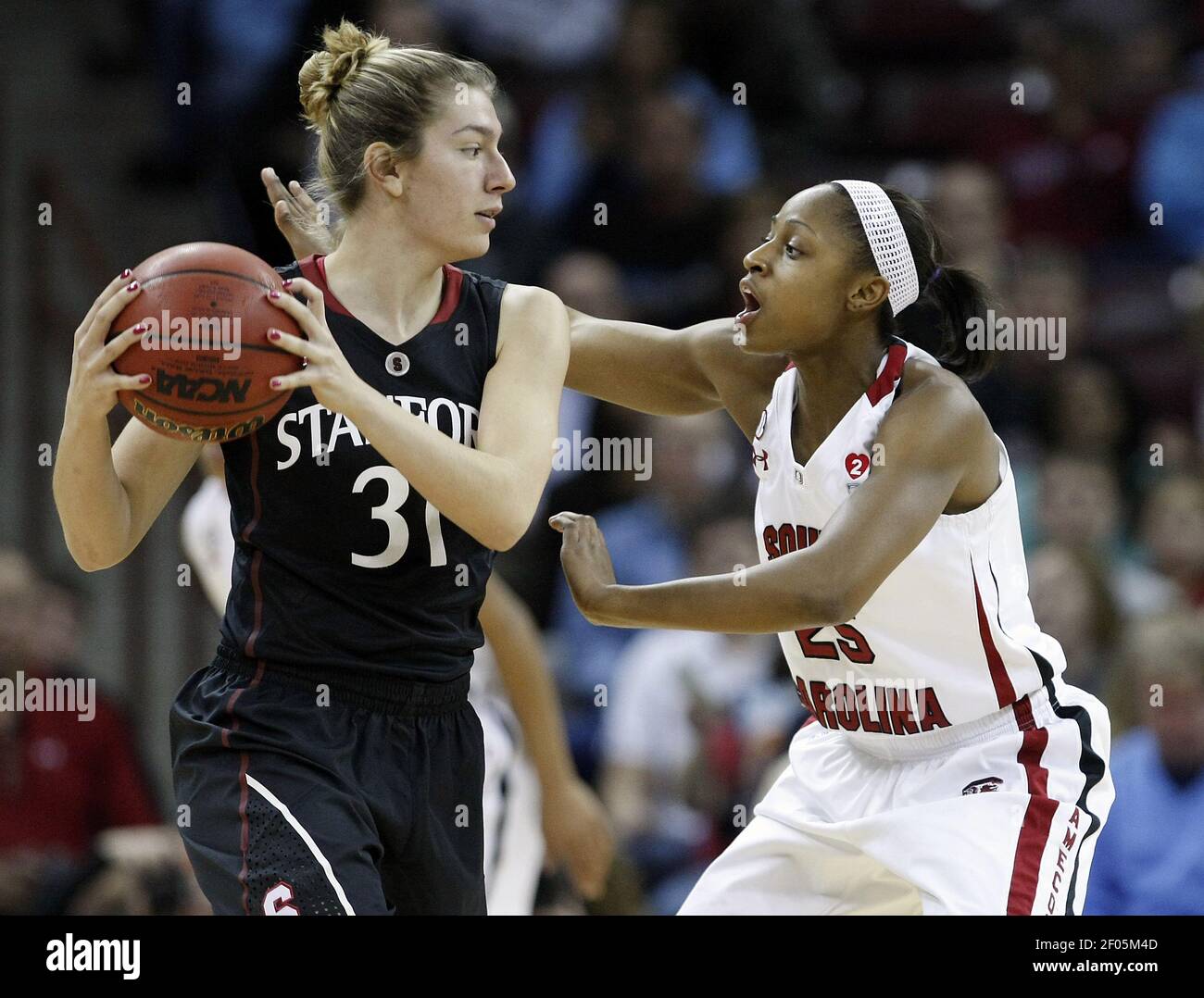 Stanford's Toni Kokenis is defended by South Carolina's Tiffany ...