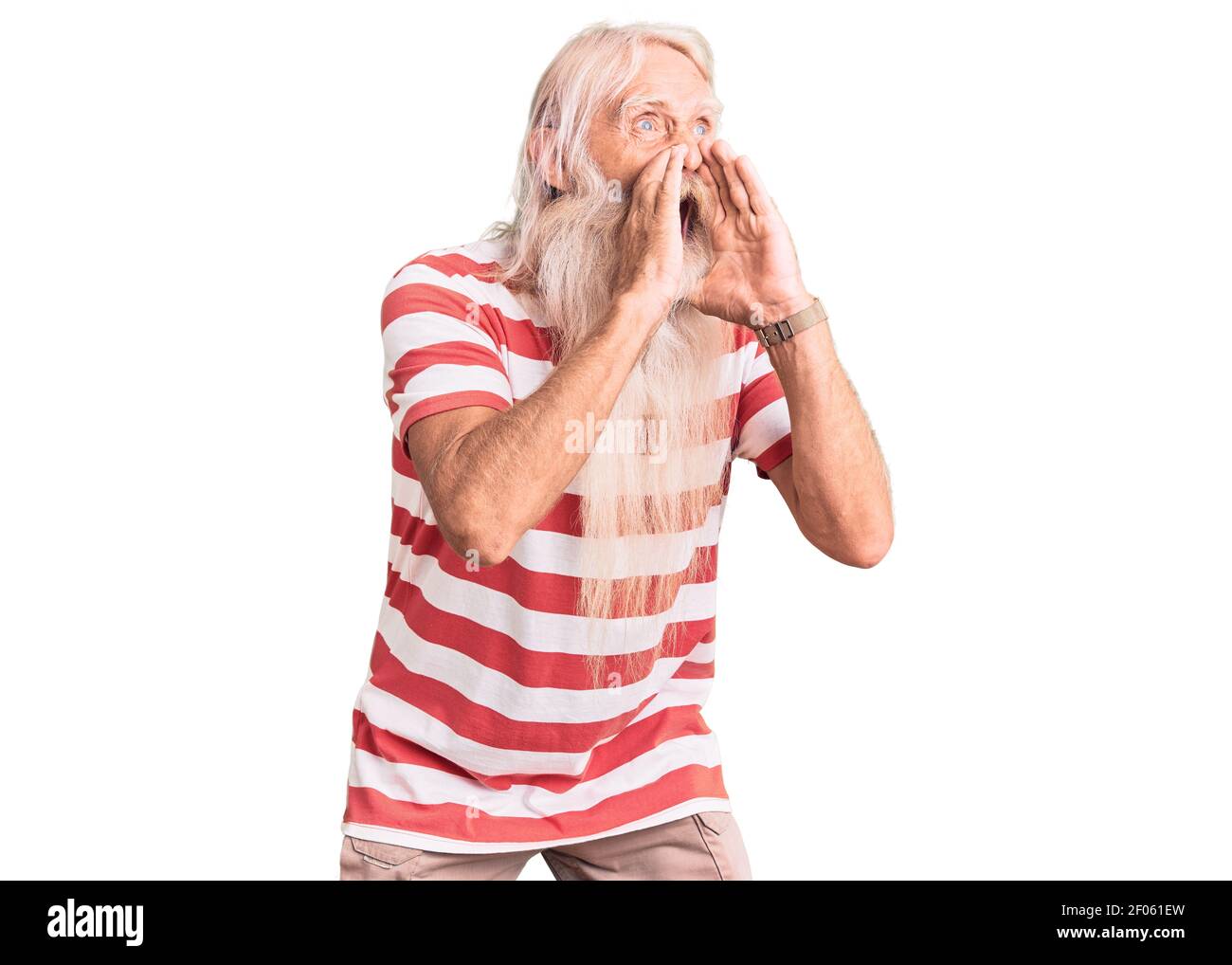 Old senior man with grey hair and long beard wearing striped tshirt ...