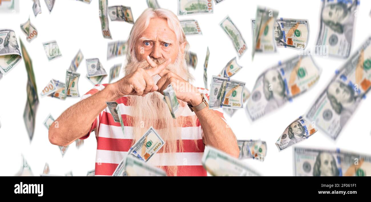 Old senior man with grey hair and long beard wearing striped tshirt ...