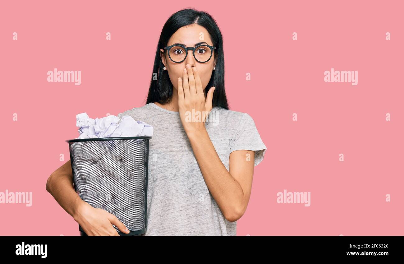 Woman holding papers shocked hi-res stock photography and images - Alamy