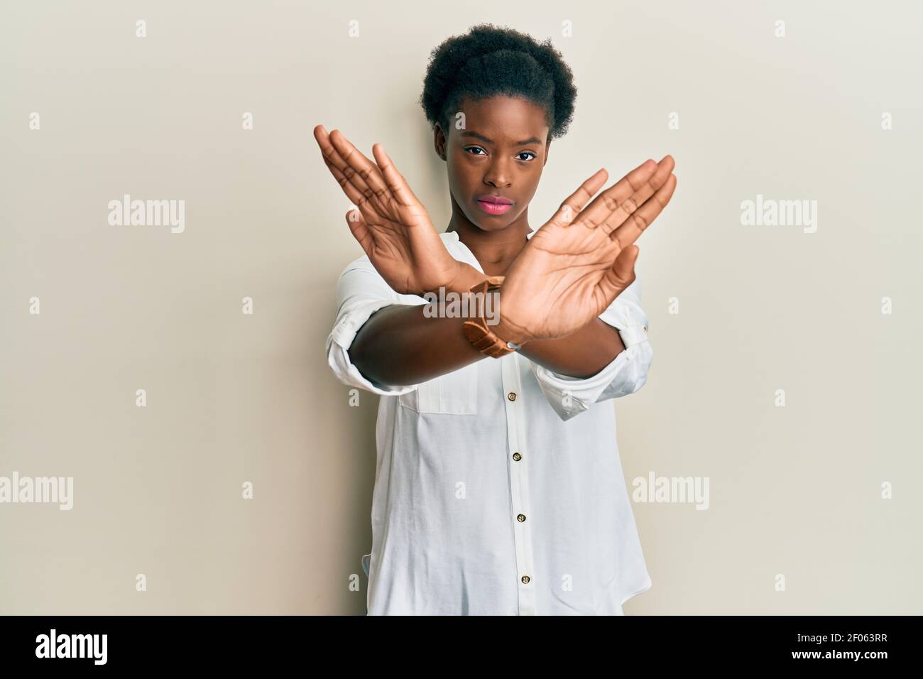 Young african american girl wearing casual clothes rejection expression ...