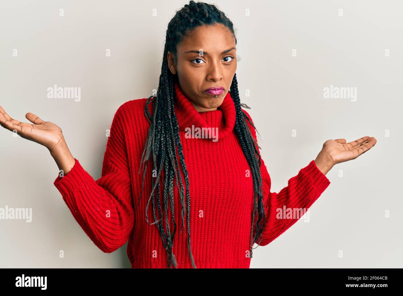 African american woman wearing casual winter sweater clueless and ...