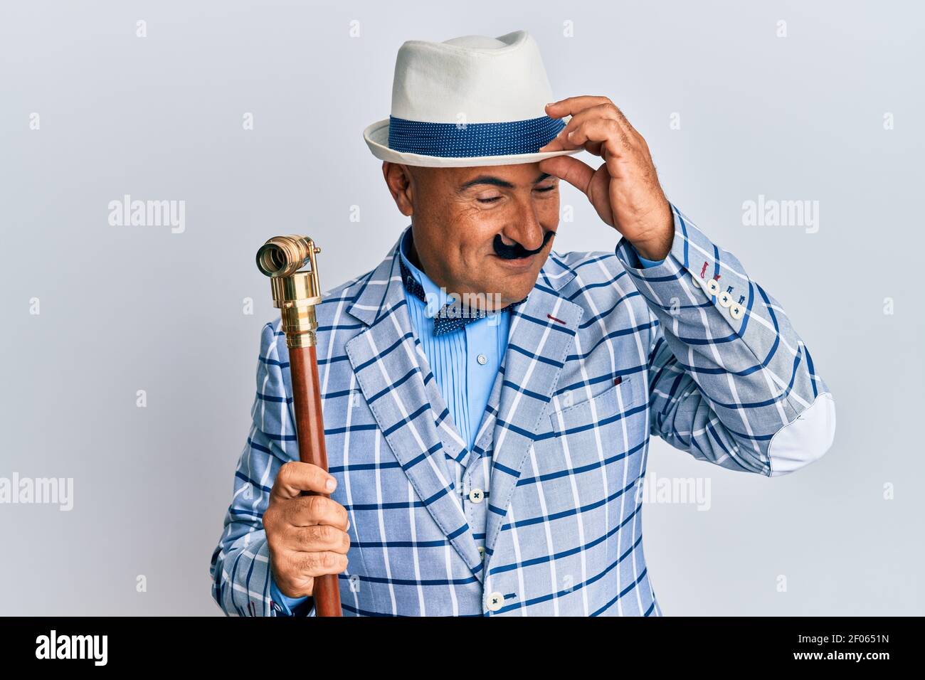 Mature middle east man with mustache wearing vintage and elegant ...