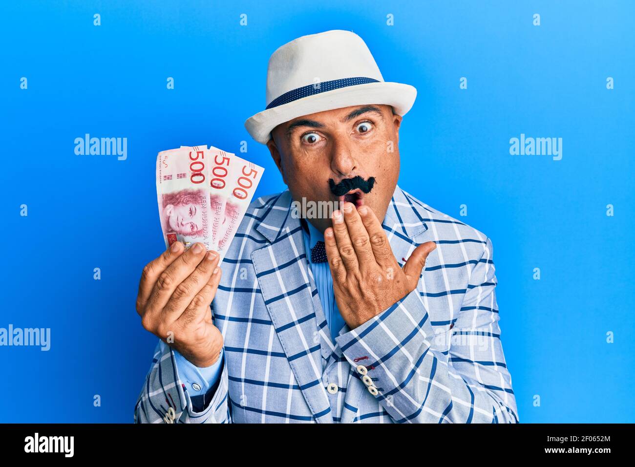 Mature middle east man with mustache wearing elegant vintage style ...