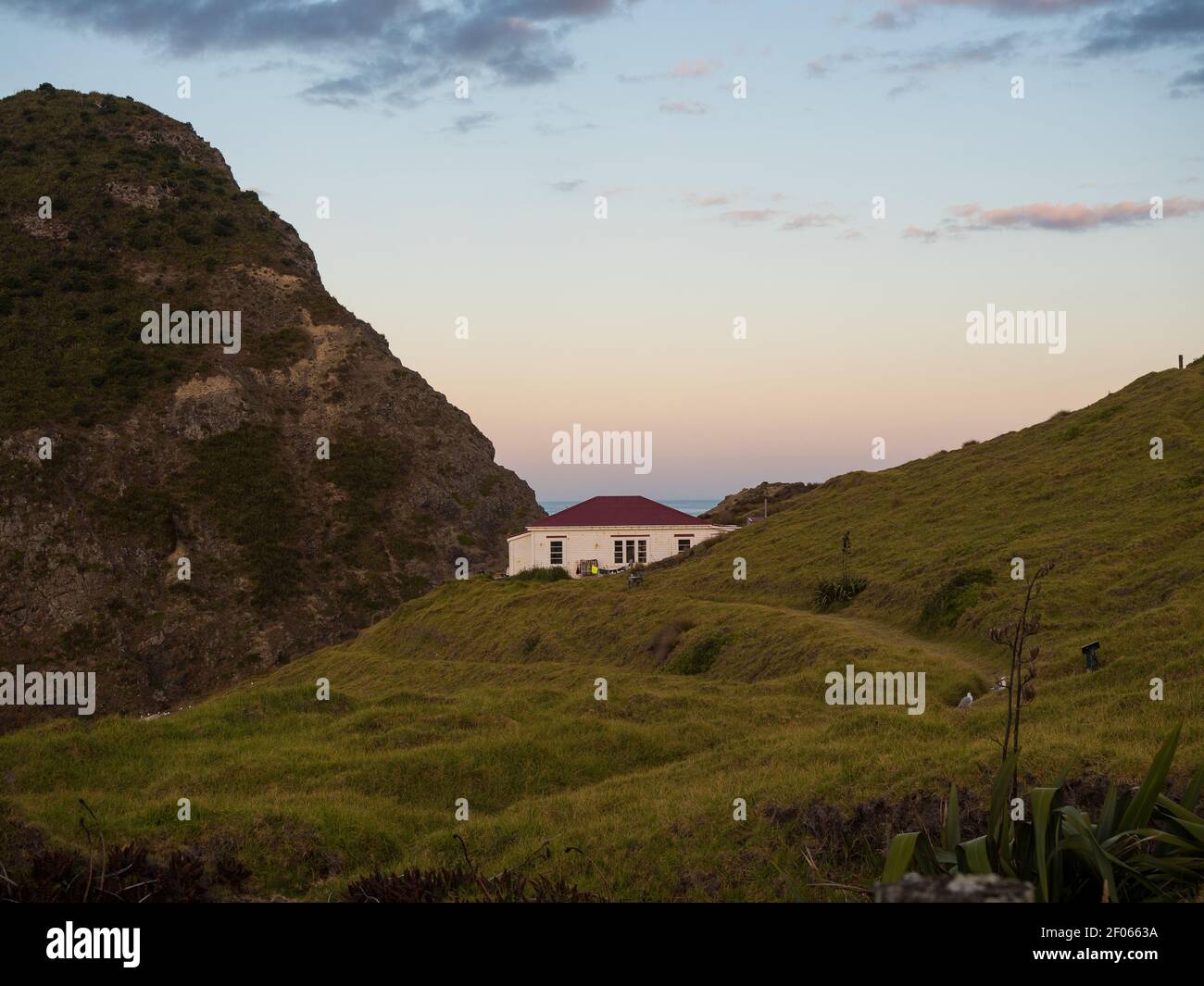 Cape Brett Lighthouse and Cape Brett Hut in Rawhiti New Zealand Stock ...