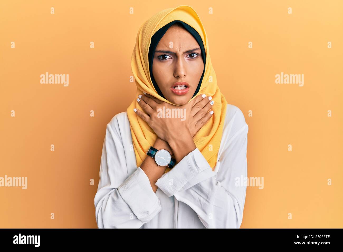 Young brunette arab woman wearing traditional islamic hijab scarf ...