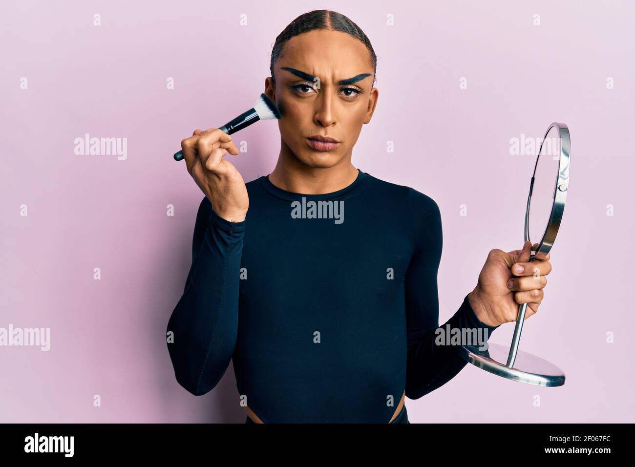 Applying makeup frown hi-res stock photography and images - Alamy