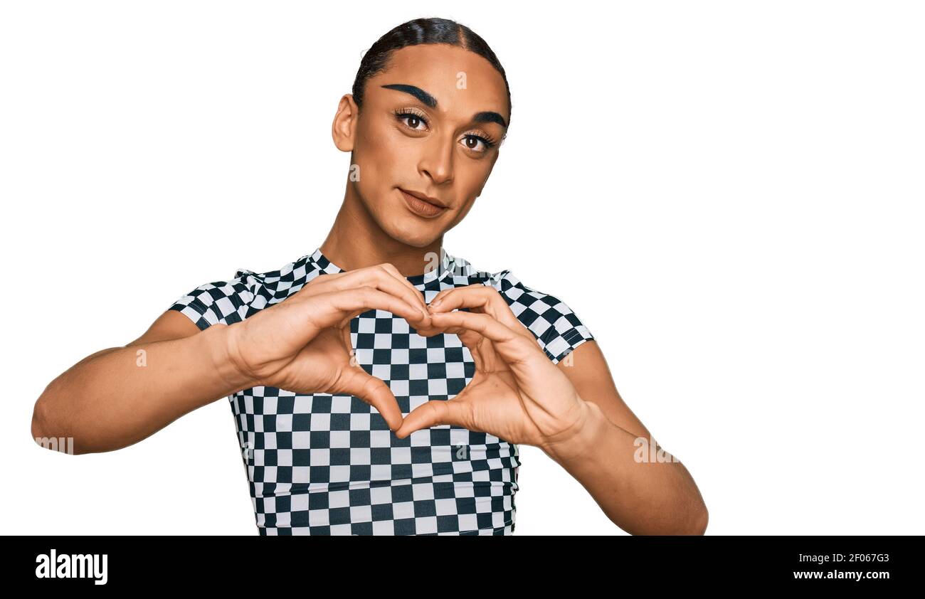 Hispanic transgender man wearing make up and long hair wearing modern ...