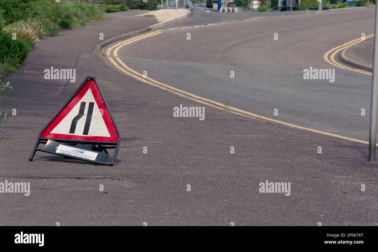 Lane merge road sign Stock Photo - Alamy
