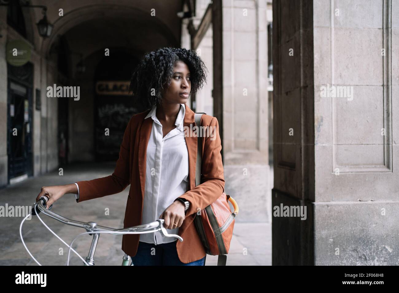 Black woman casual walking along street hi-res stock photography and ...