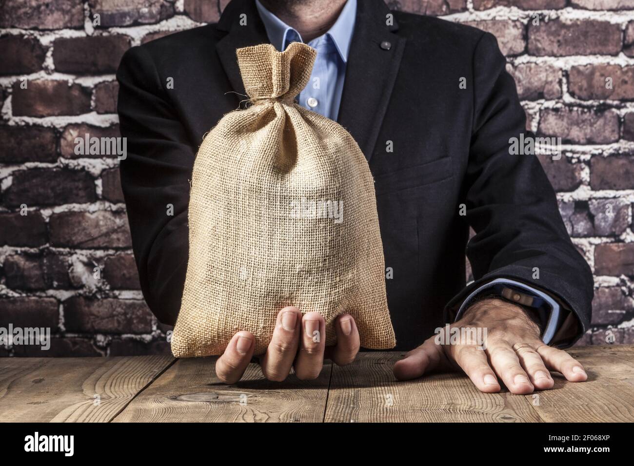 Money in Sack Stock Photo - Alamy