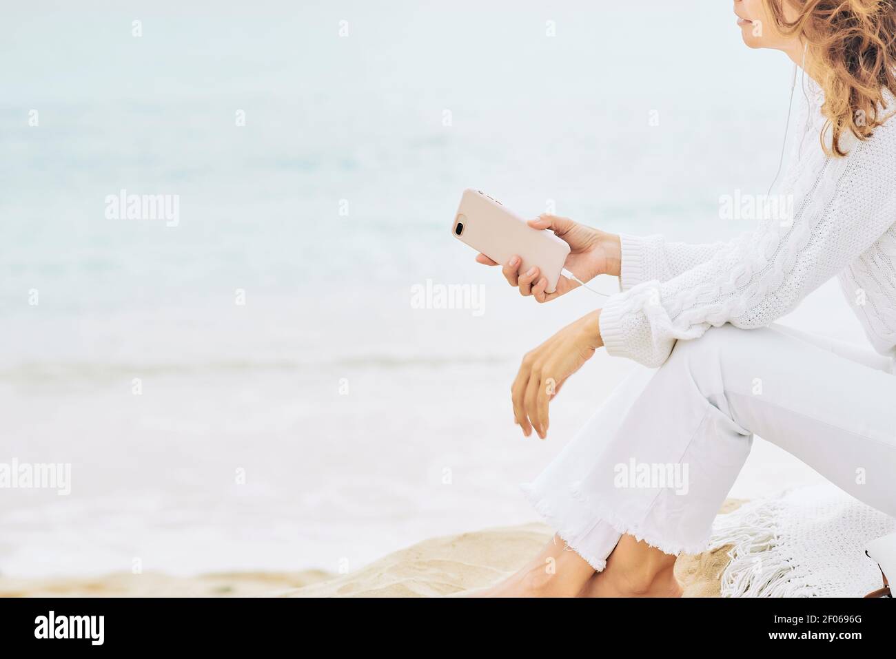 Full body of unrecognizable young female millennial in casual clothes ...