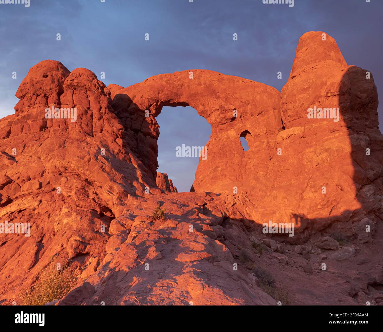 Amazing landscape with arched formation in red rock near rare ...