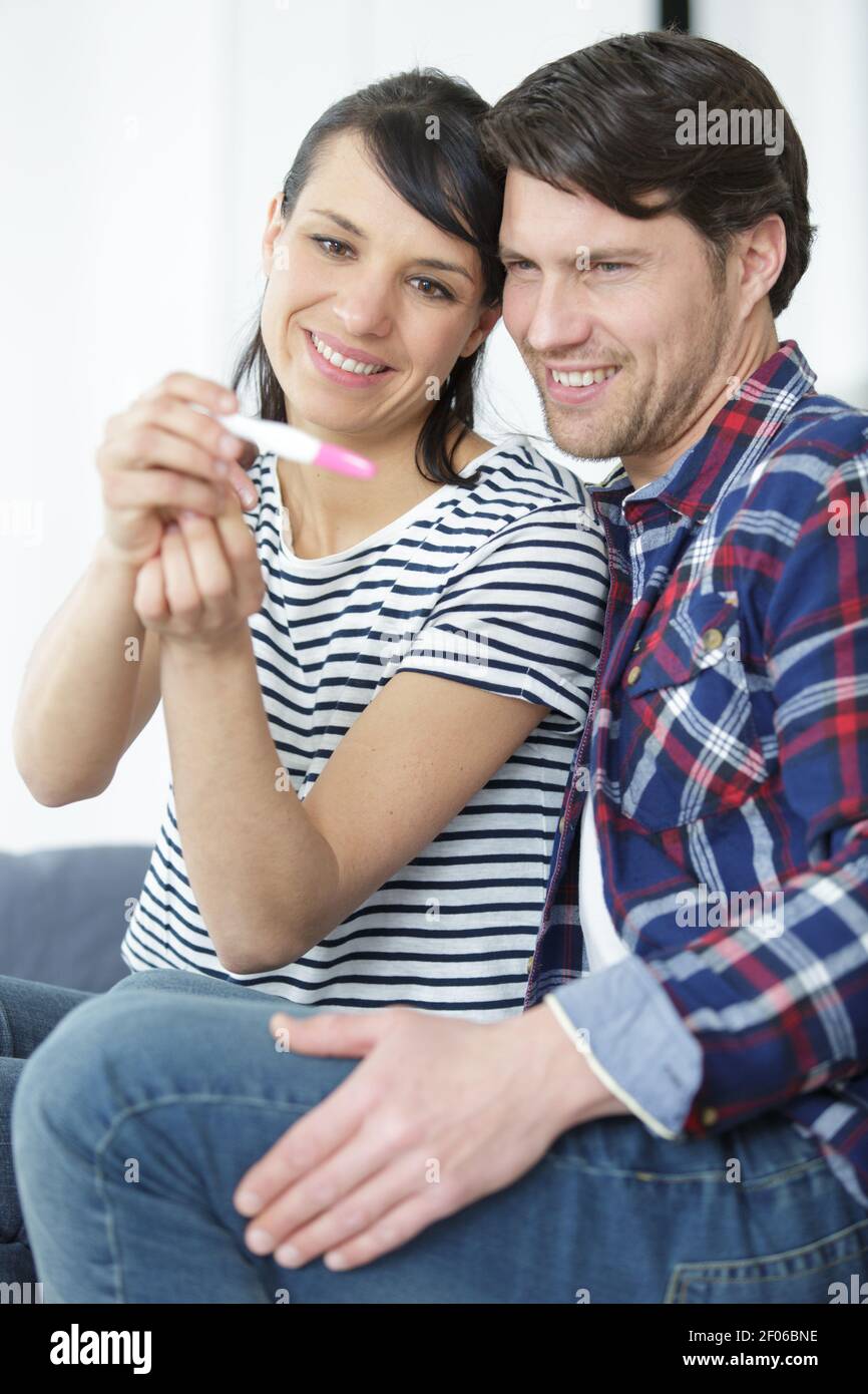 Excited couple in bedroom hi-res stock photography and images - Alamy