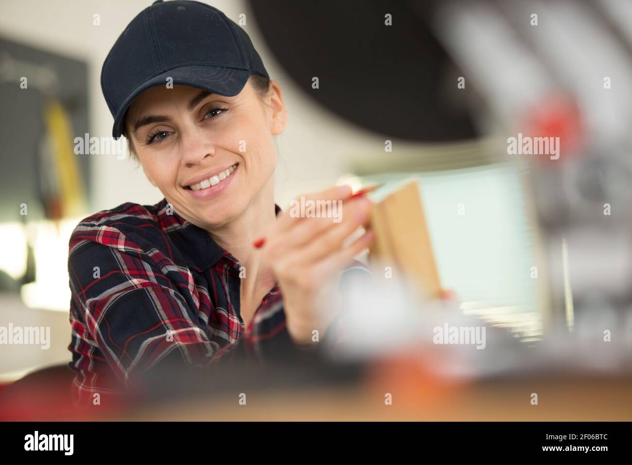 happy hardworking focused professional carpenter woman Stock Photo - Alamy