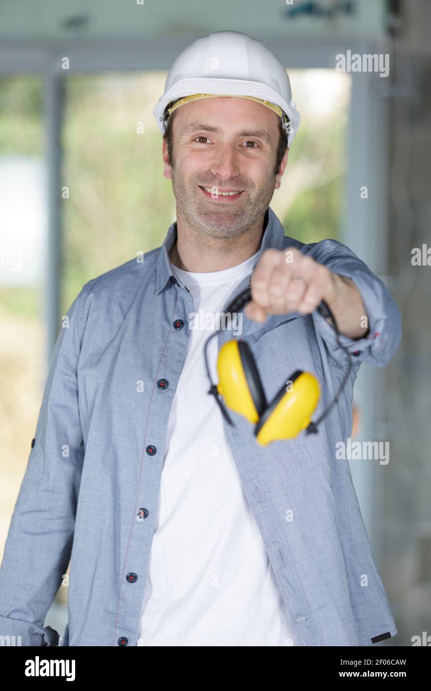 Engineer worker helmet ear protection hi-res stock photography and ...