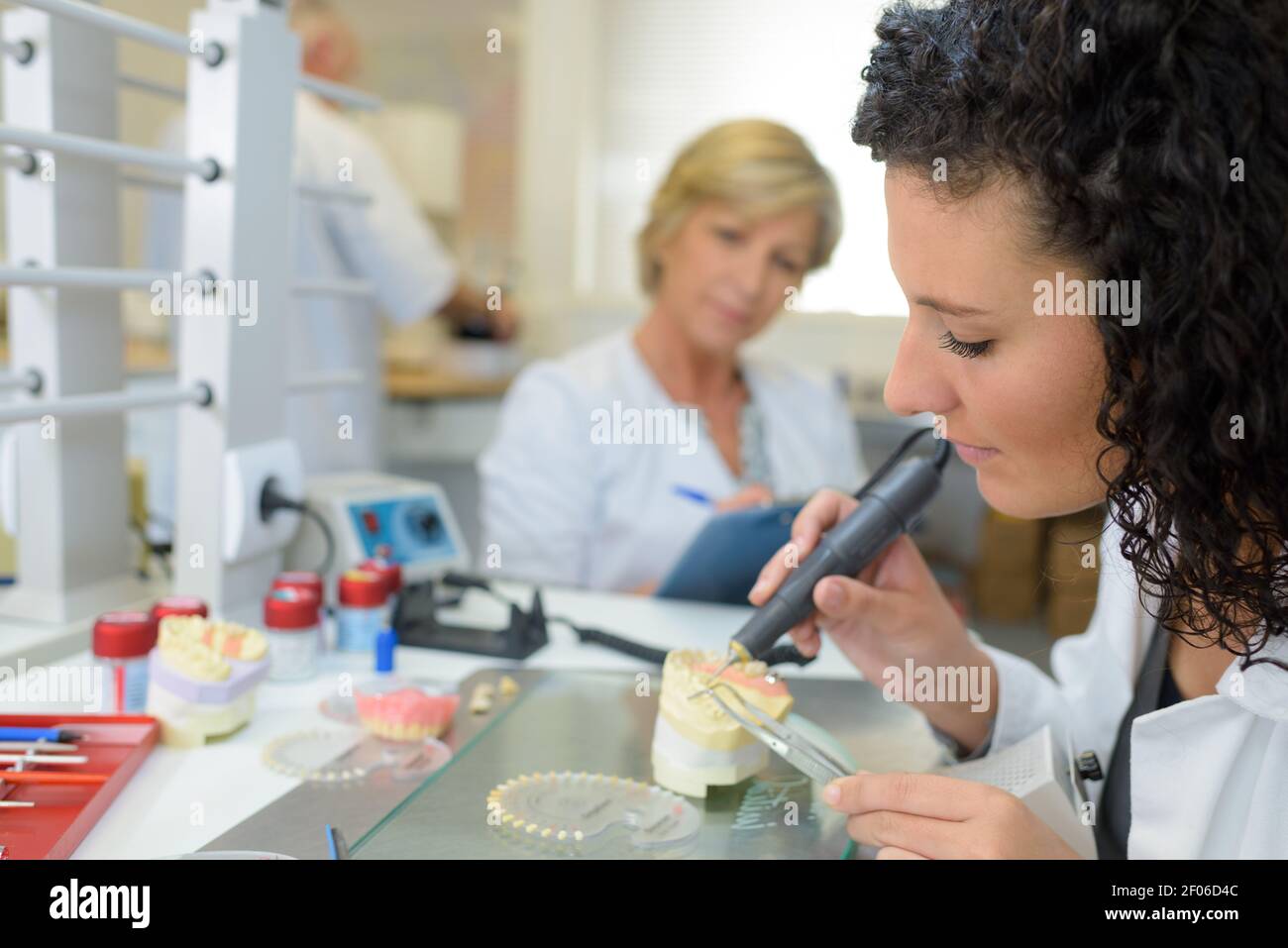 grading a laboratory dental prosthetic technician Stock Photo - Alamy