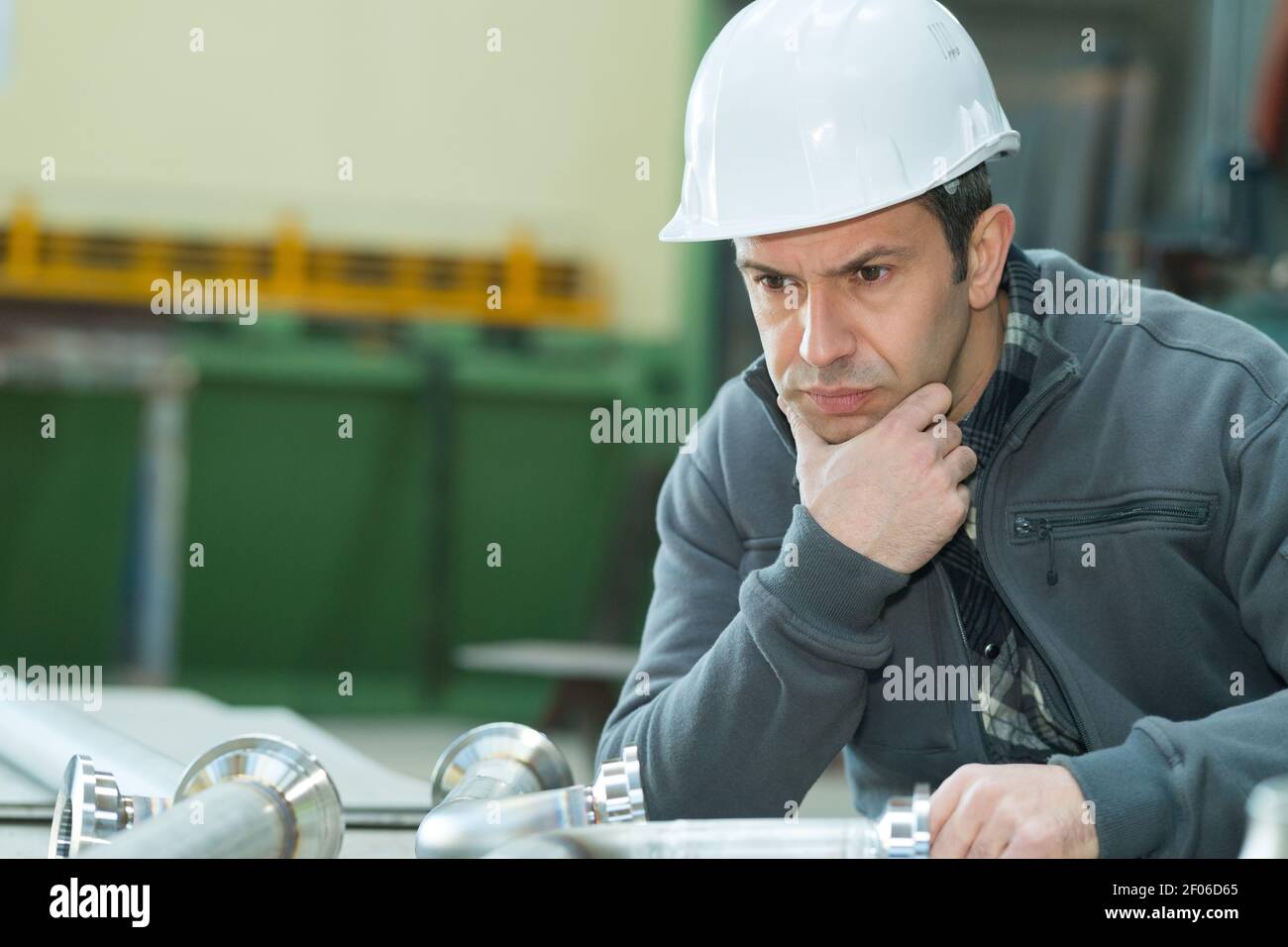 portrait of stressed engineer at work Stock Photo - Alamy