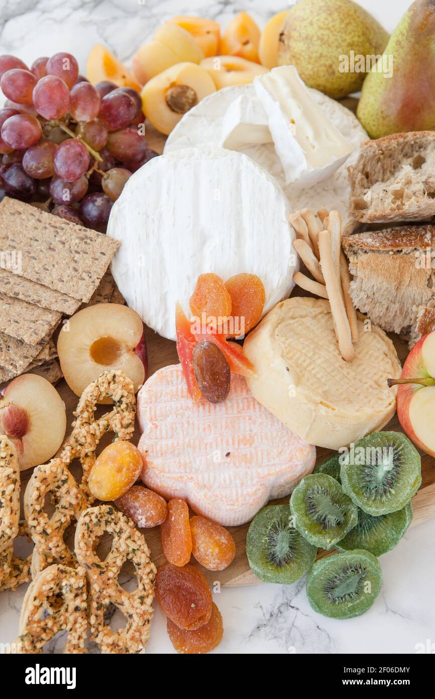 Rustic cheese plate Stock Photo - Alamy