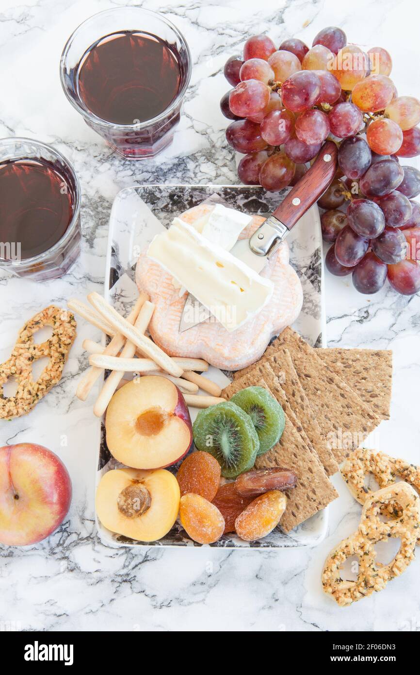 Rustic cheese plate Stock Photo - Alamy