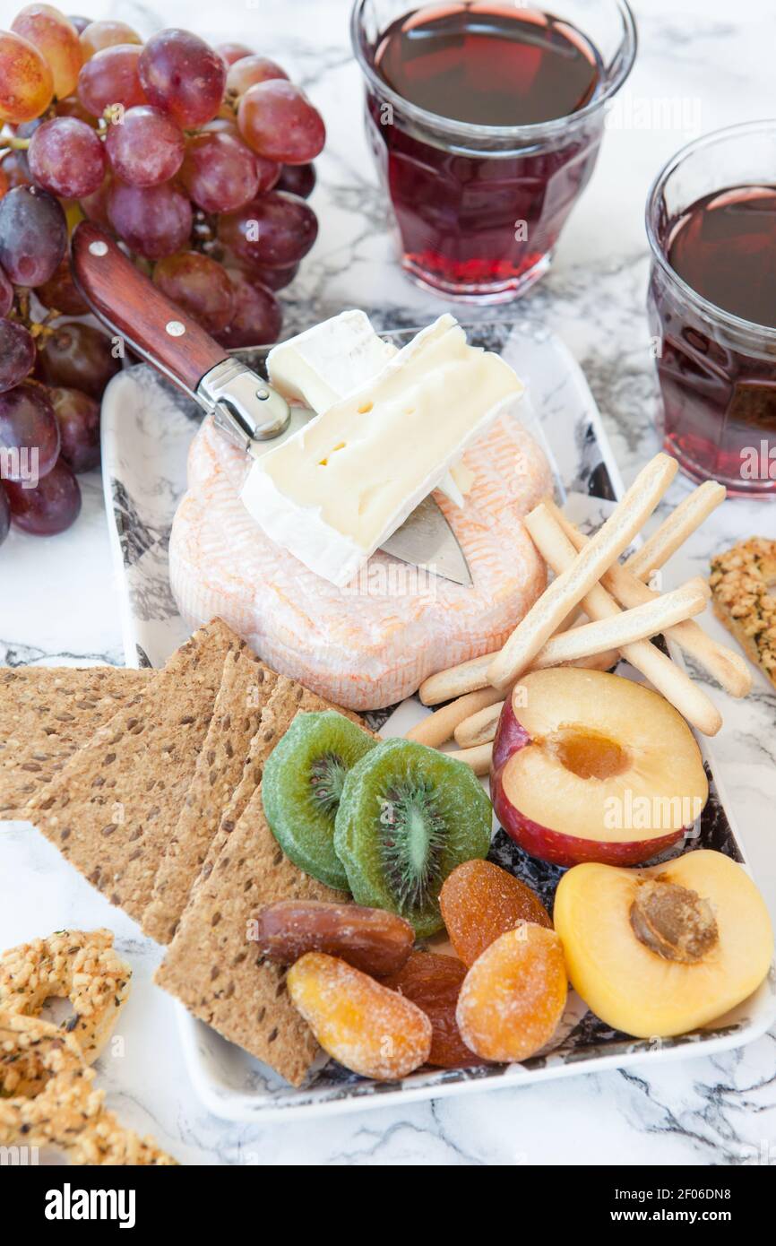 Rustic cheese plate Stock Photo - Alamy