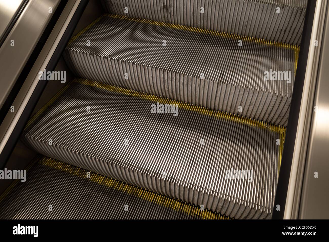 Top view from eye level riser and tread of escalator Stock Photo - Alamy