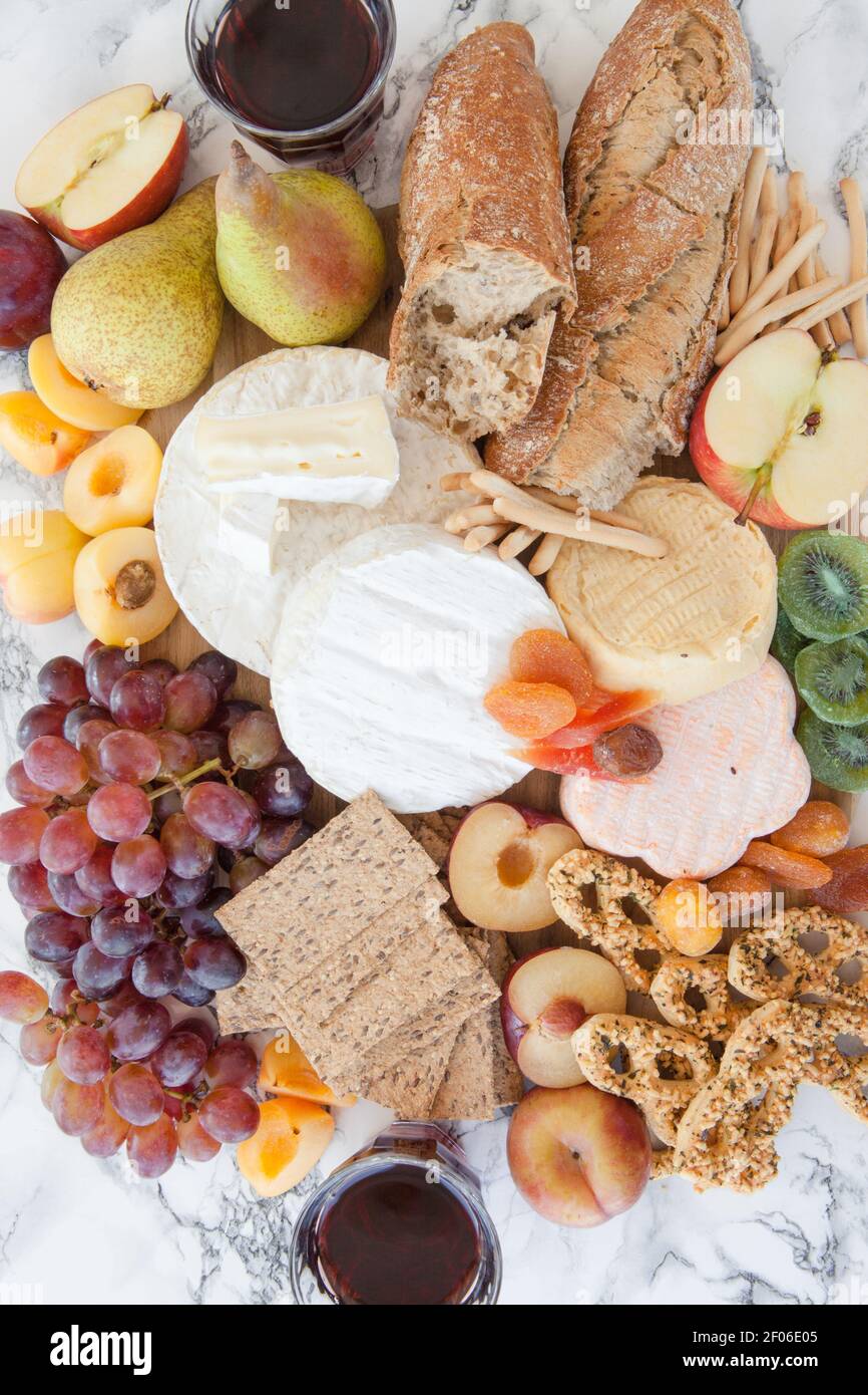 Rustic cheese plate Stock Photo - Alamy