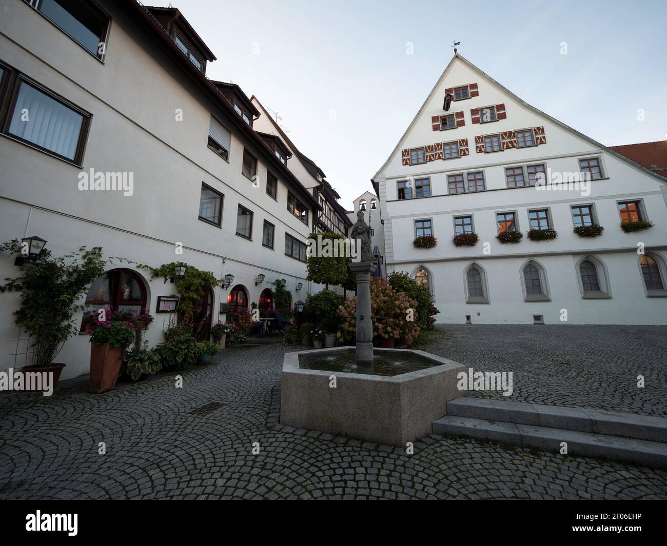 Water fountain spring in pedestrian zone market square place of ...