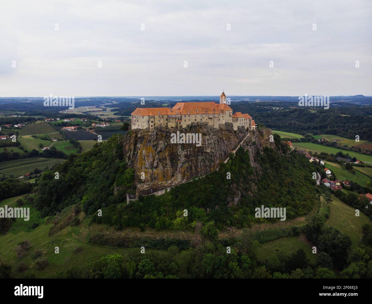 Aerial panorama view of historic old medieval castle Riegersburg on ...