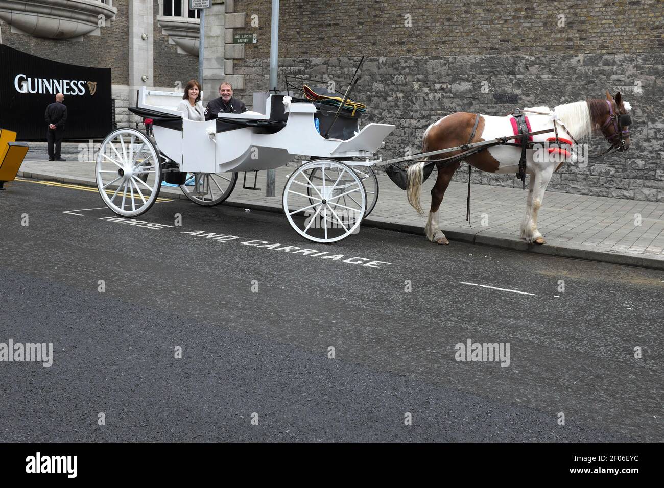 Tourists In A Horse & Carriage Outside The Guinness Brewery In Dublin ...