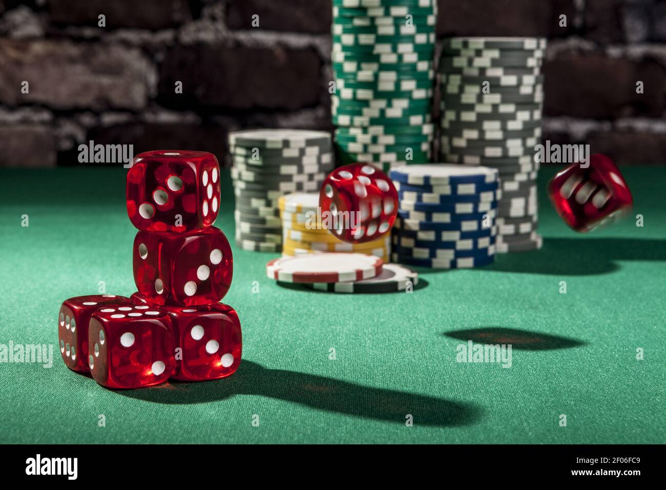 Falling Red Dice Stock Photo - Alamy