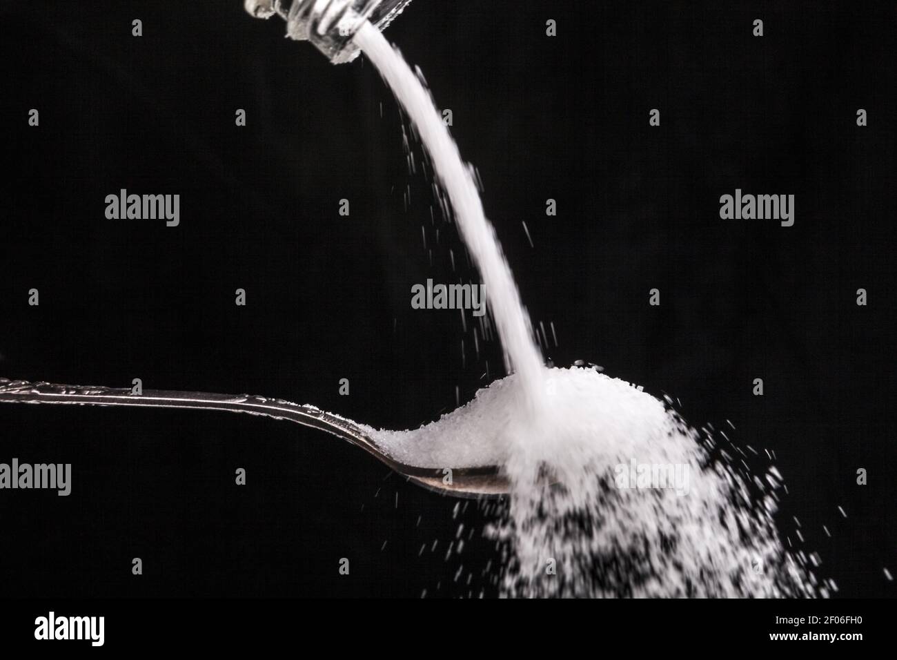 Salt in Spoon Stock Photo - Alamy
