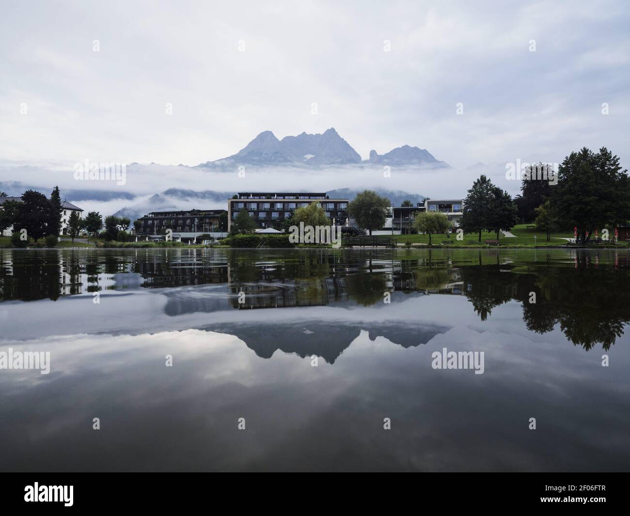 Mirror reflection panorama view of alps mountains in Ritzensee Lake ...