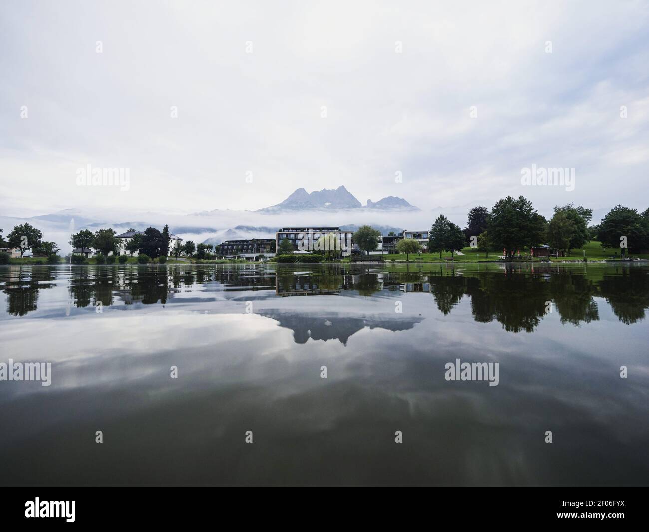 Mirror reflection panorama view of alps mountains in Ritzensee Lake ...