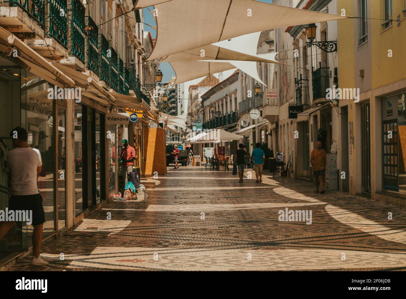 Faro, Portugal - April 9 2020. Shopping street in Faro City. Square in ...