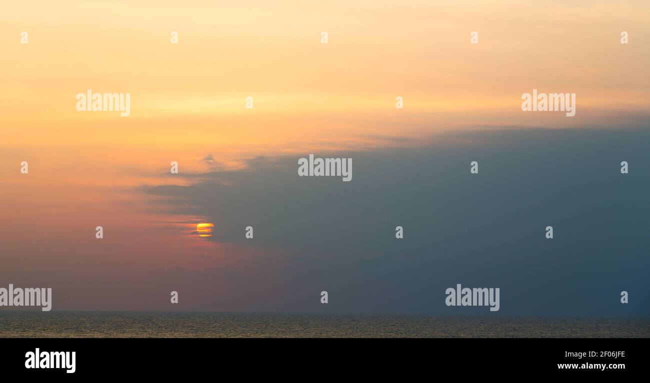 In oman coastline the blurred sun falling down arabian sea ocean Stock ...