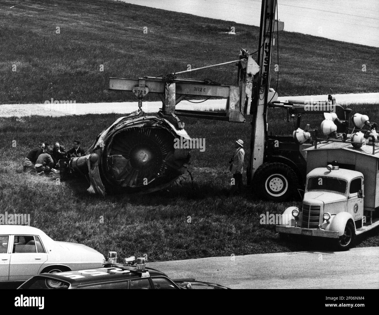 The DC-10 engine lays on the grass just east of Runway 32, right, where ...