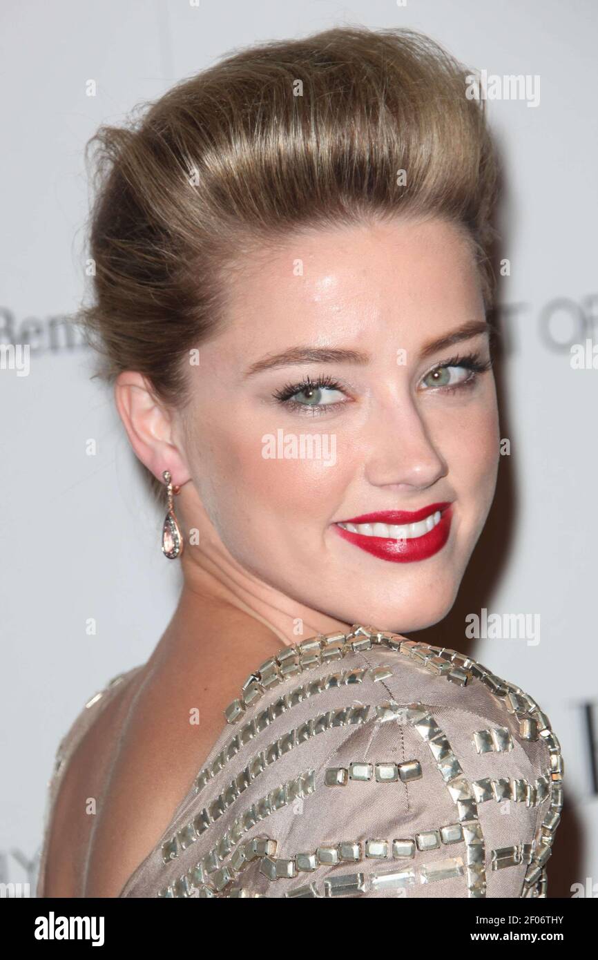 15 January 2011 - Los Angeles, CA - Amber Heard arrives to the 2011 Art ...