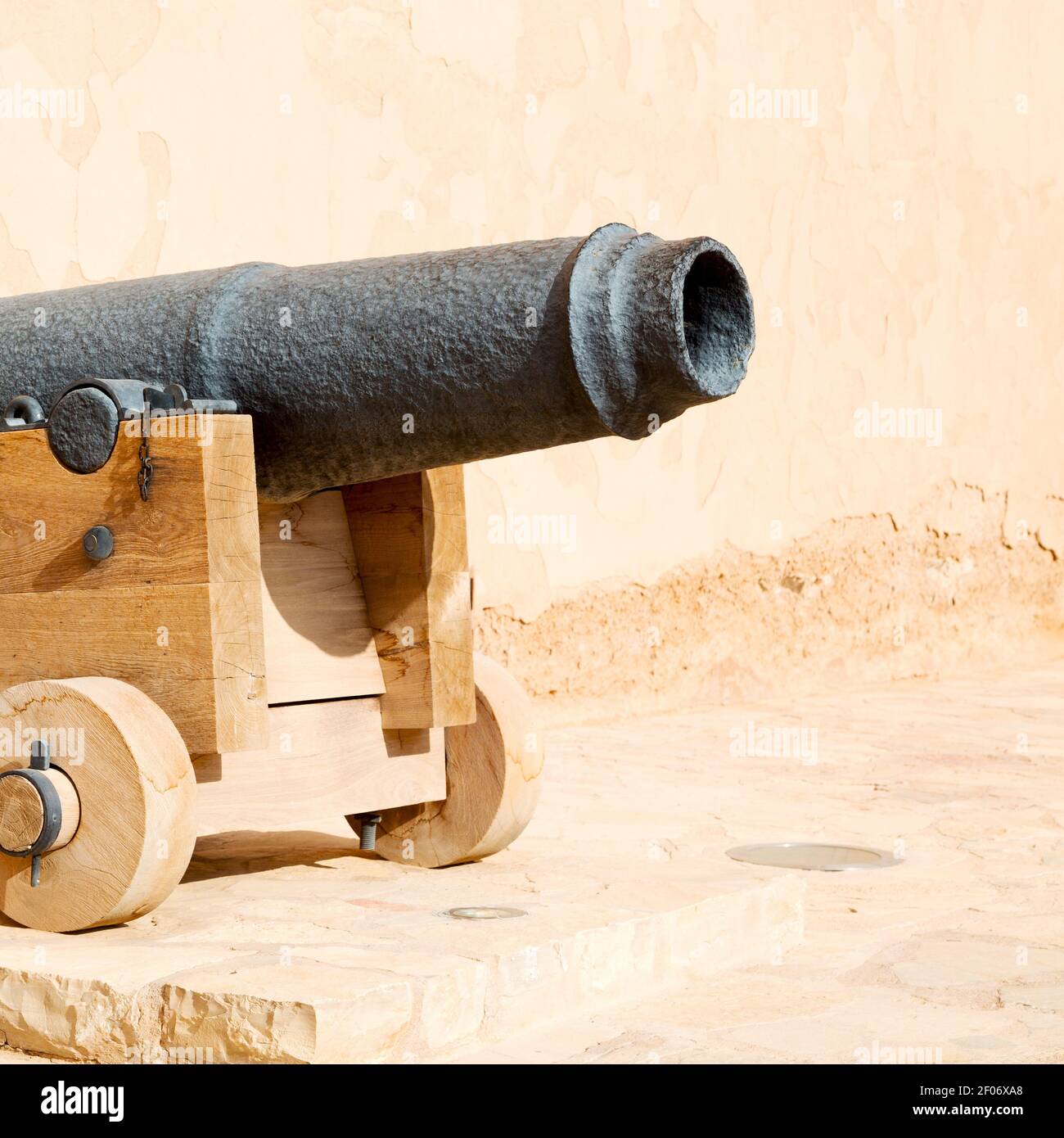 In oman muscat the old castle and cannon near the wall Stock Photo - Alamy