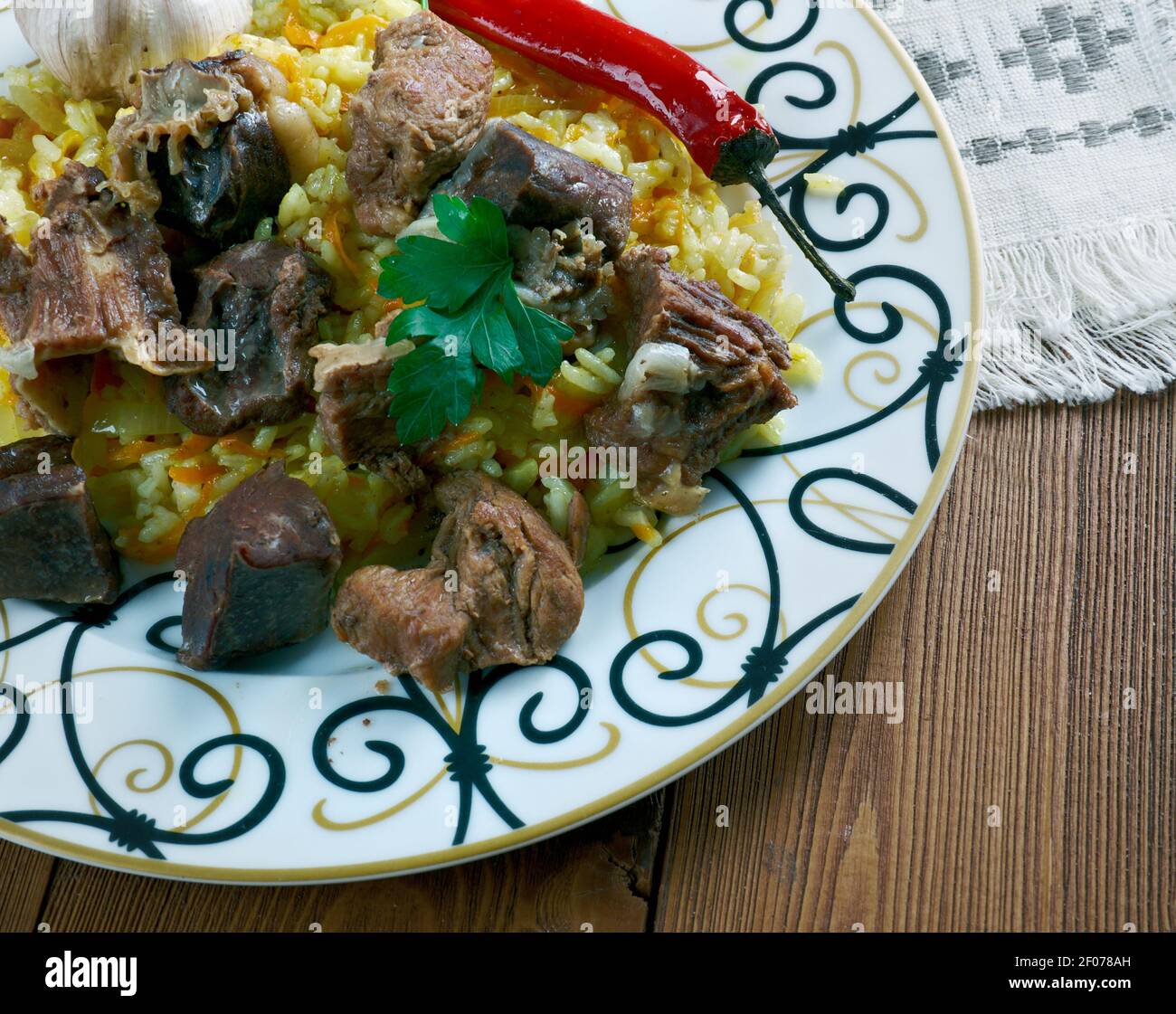 Uzbek rice dish with lamb Stock Photo - Alamy