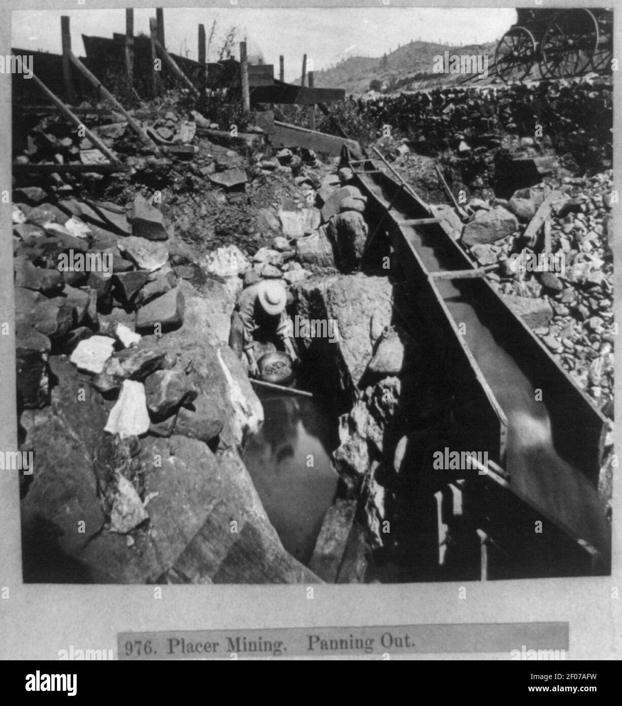 Placer mining - panning out Stock Photo - Alamy