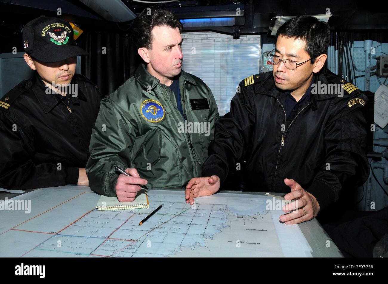 13 March 2011 - Japan - U.S. Navy Capt. Jim Morgan, middle, commander ...