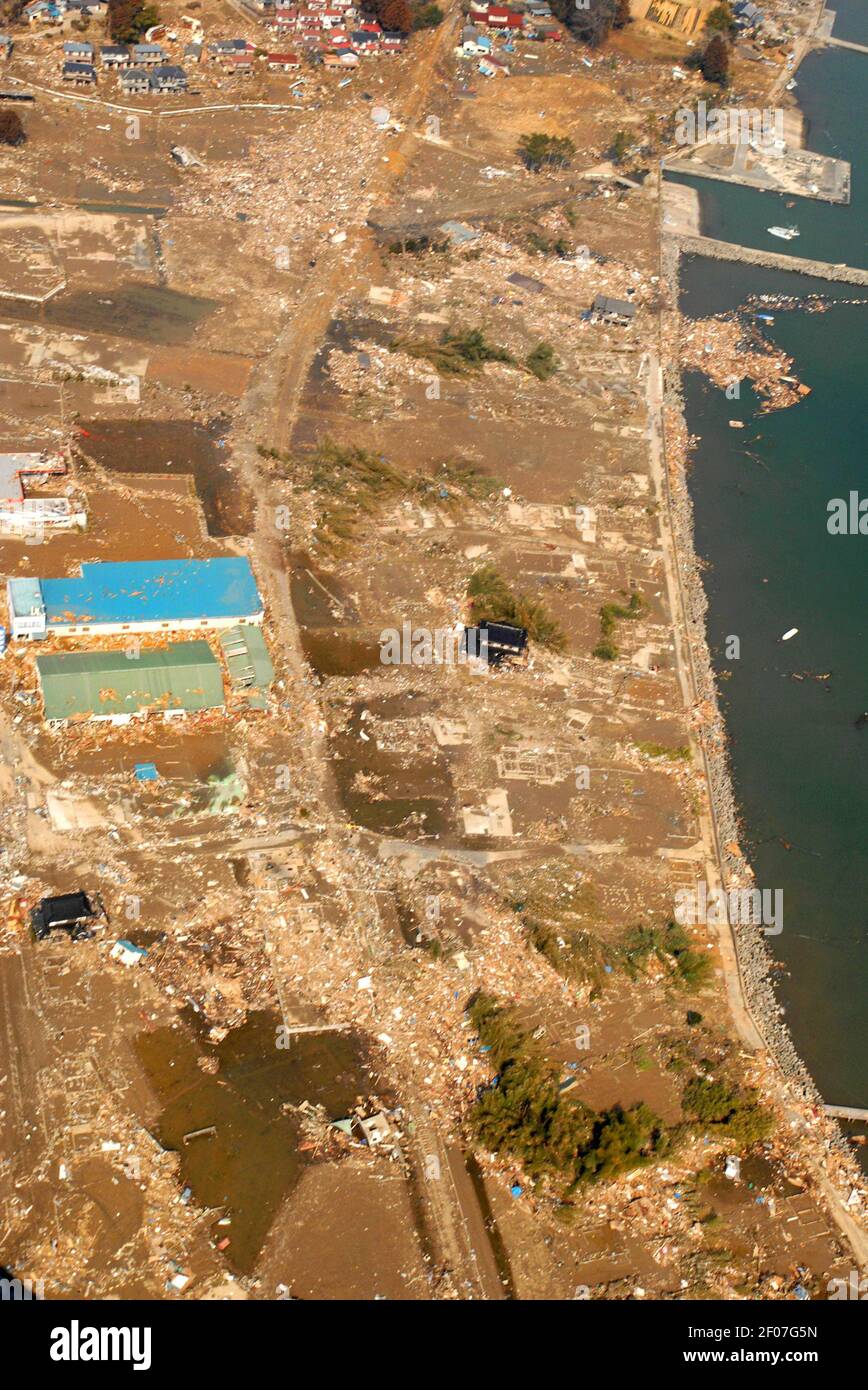 13 March 2011 - Japan - An aerial view of tsunami damage north of ...